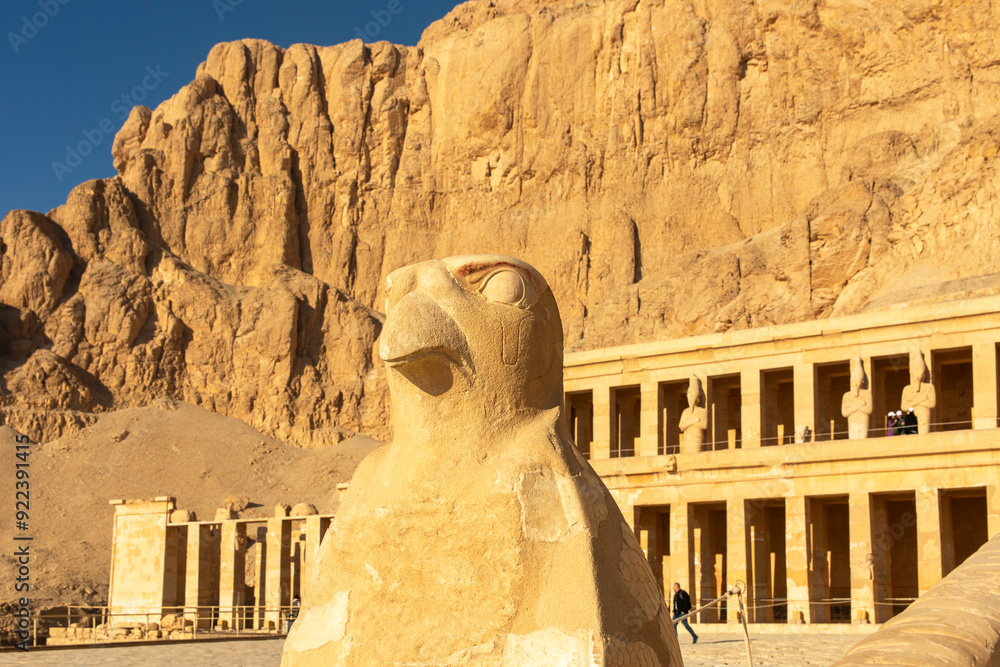 The statue of Horus, the falcon-headed god, stands guard over the ...