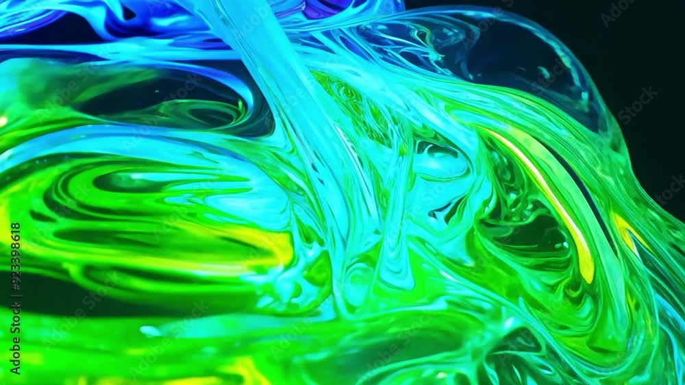 Light sensitive liquid color and light beams combine in wavy flowing ...