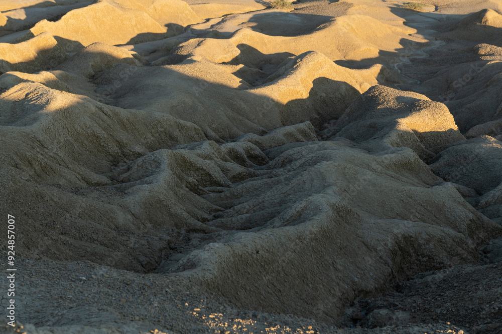 Arid landscape with mud rivers formations in Romania. This is a unique ...