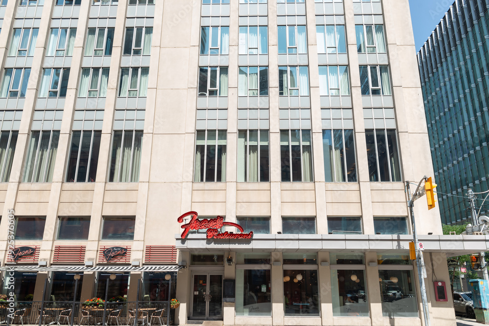 exterior building facade and sign of Fran's Restaurant, a diner chain ...