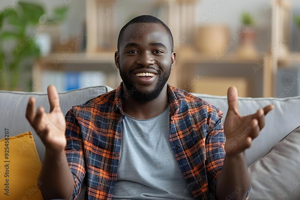 An African American deaf man happily using sign language with a friend ...