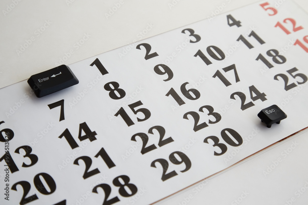 Two Enter keys and an Escape key on a calendar instead of the first day ...