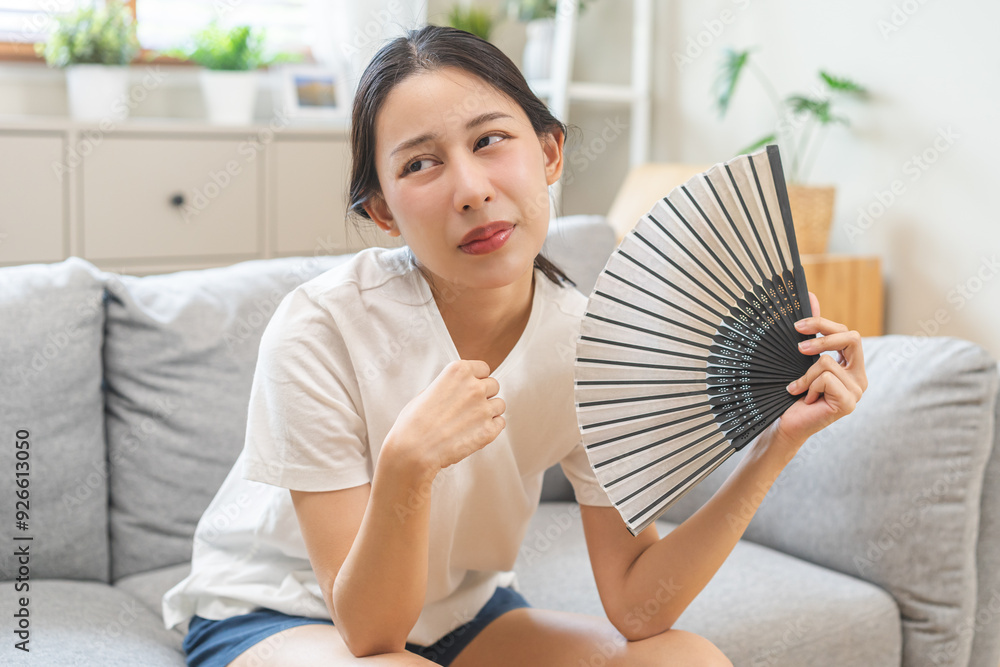 Suffering summer heat wave stroke, hot weather, tired asian young woman ...
