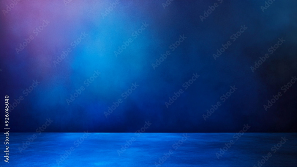 Elegant studio backdrop with a deep blue gradient and a smooth, misty ...