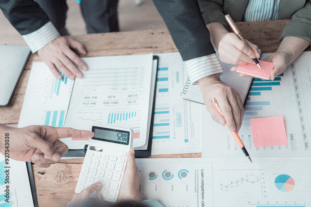 Business meeting, various international executives discuss reports at ...