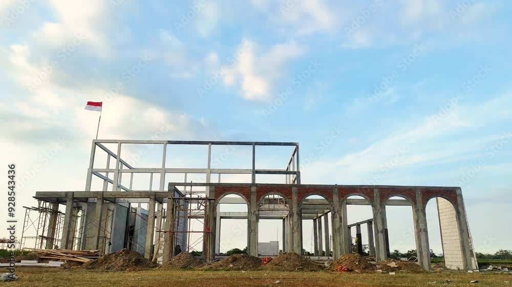 The frame structure of office building with Indonesia flag during ...