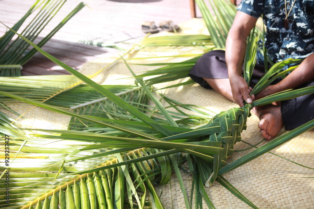 Fijian traditional basket weaving from palm leaves, men's basket ...
