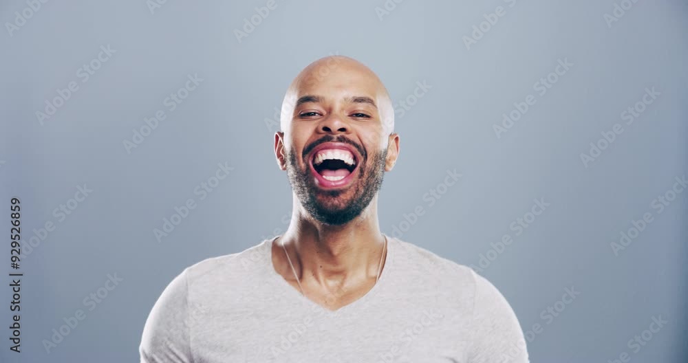 Comic, face and man laughing in a studio for funny or silly joke in ...
