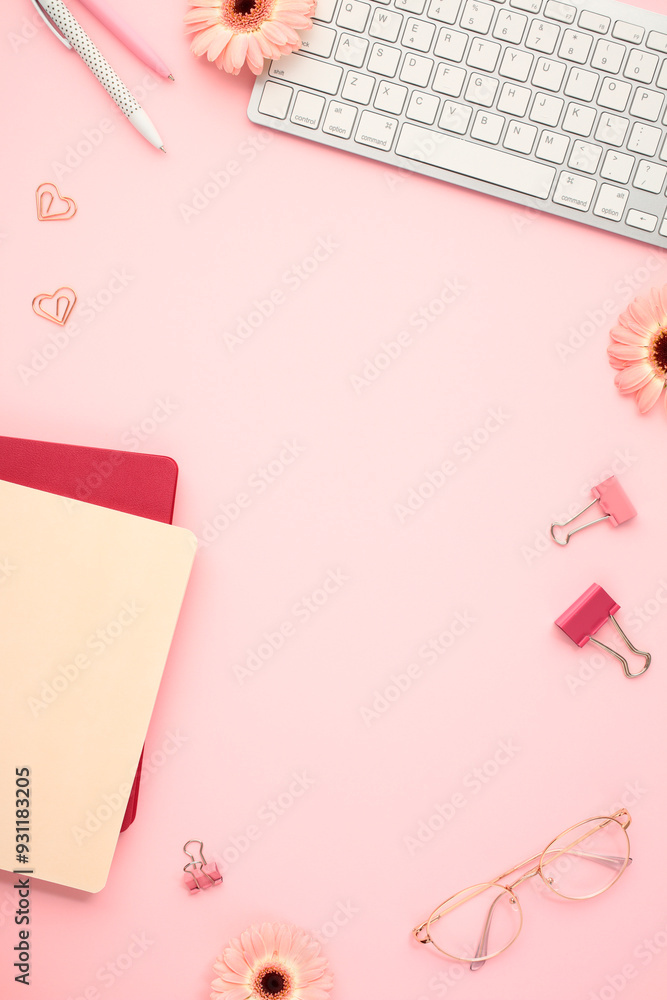 Flat lay modern workspace with office supplies on pink background ...