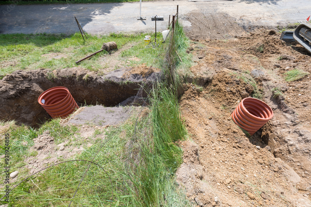 Storm sewer pipes laying. Building construction on Construction site ...