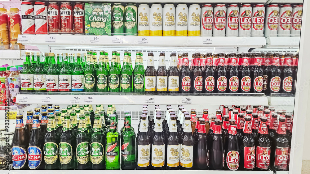 Thai beer on supermarket shelves. Various brand of beer and alcohol ...