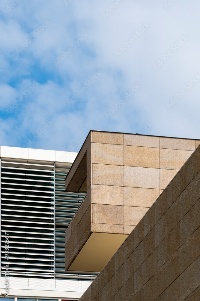 A modern architectural corner showing clean lines and angles against a ...