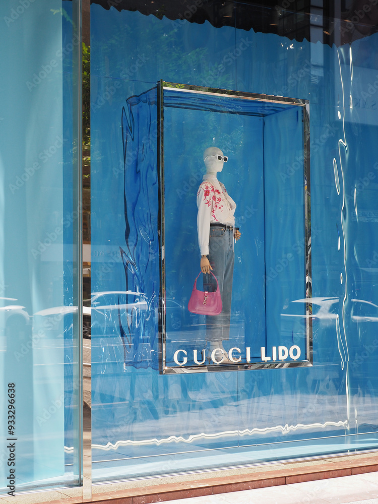 TOKYO, JAPAN - July 21, 2024: Display in the window of a Gucci store in ...