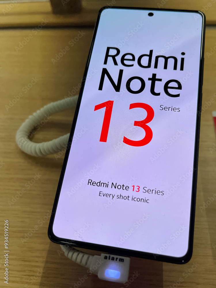 Redmi Note 13 Series Smartphone Display with Features Stock Photo ...