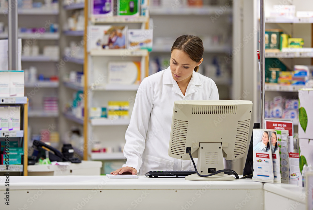 Pharmacy, computer and stock list with woman at counter in drugstore ...