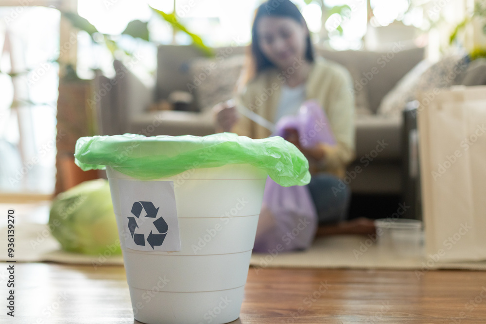 Close up, Rubbish bin with recycle symbol in home have a woman ...