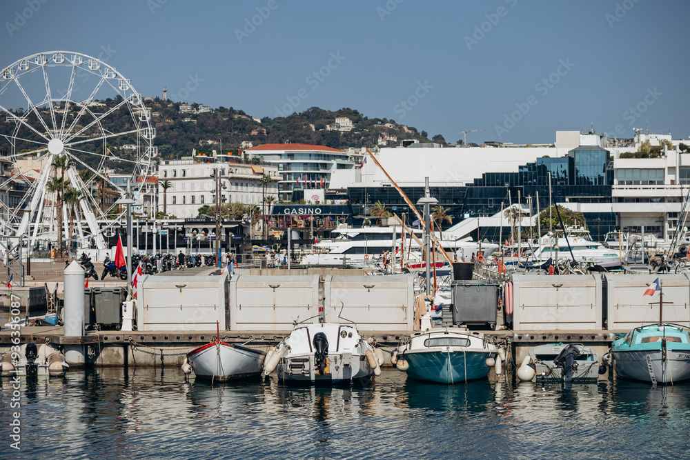 Cannes, France - August 1, 2024: Port in the center of Cannes, on the ...