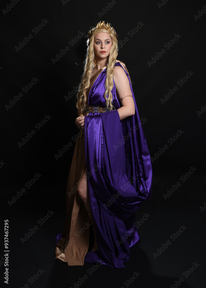 full length portrait of beautiful blonde female model wearing purple ...
