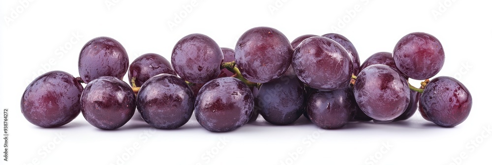A cluster of fresh, ripe, purple seedless grapes, arranged in a single ...