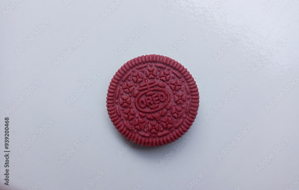 Stack Red Velvet flavored Oreo cookies with vanilla cream in the middle ...