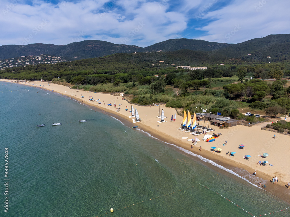Aerial view on boats, crystal clear blue water of Plage du Debarquement ...