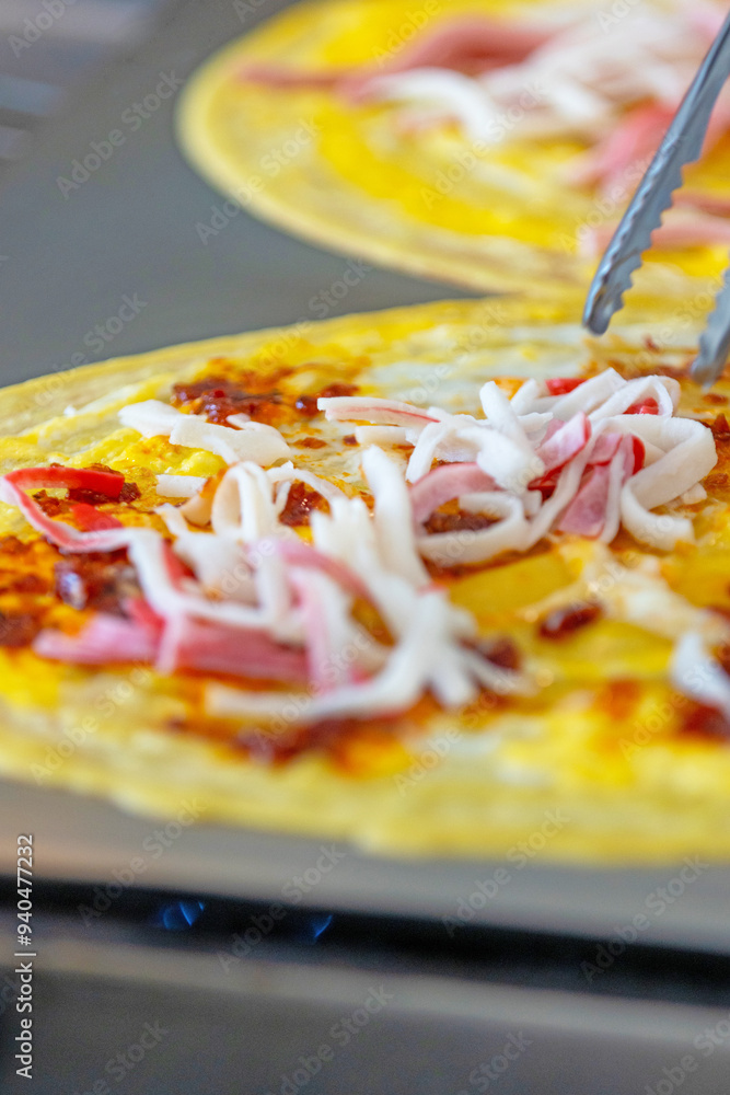 Japanese crepes are light, crispy desserts made by frying a thin layer ...