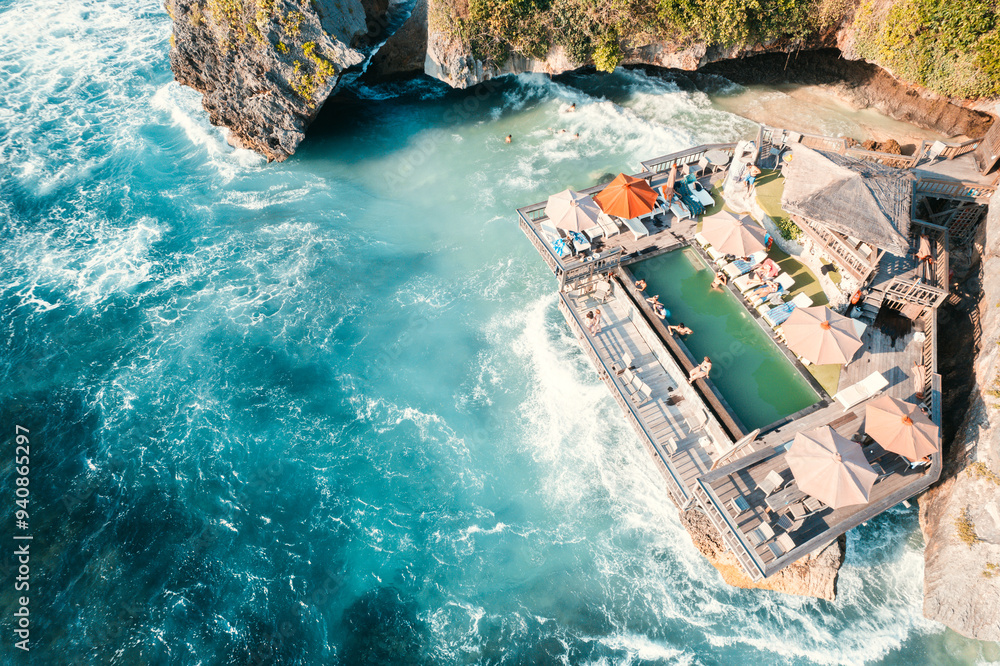 Aerial photography of the beach club at Blue Point Beach in Bali ...