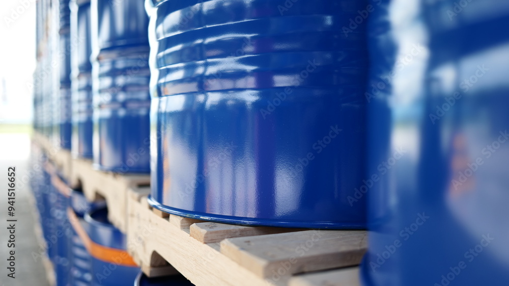 Barrels of 200 liters each, neatly stored in a warehouse, showcasing ...