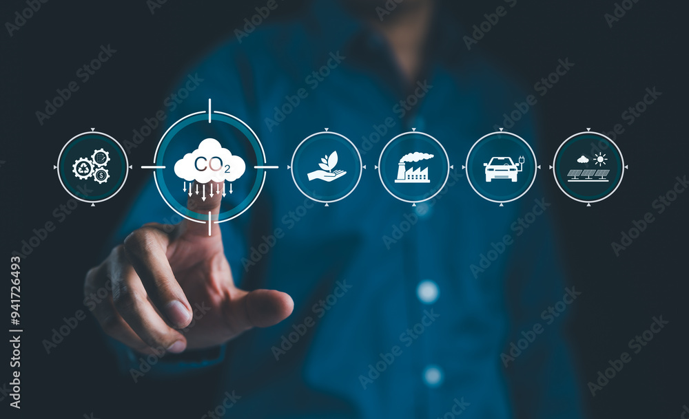 Reduce CO2 emission concept. A person touches CO2 emissions reduction ...