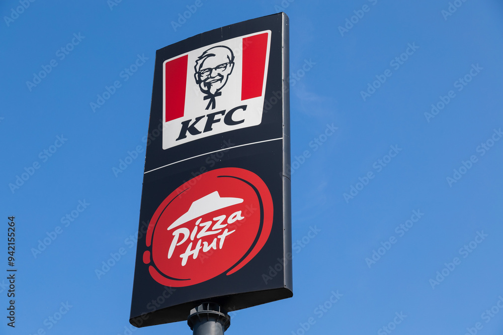 Warsaw, Poland - August 24, 2024: Pizza Hut and KFC (Kentucky Fried Chicken) logos - AmRest ...