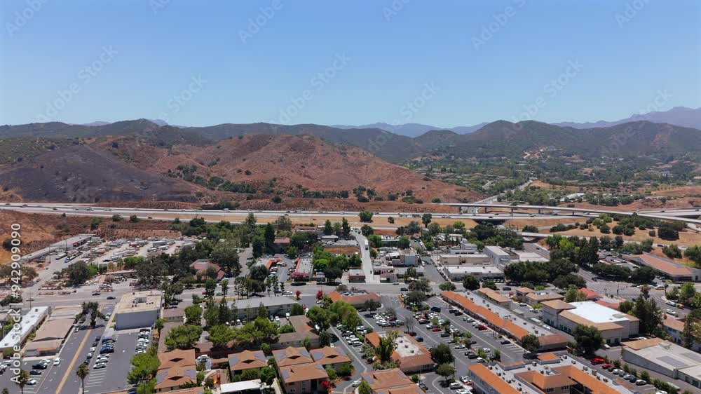 This aerial view showcases the vast suburban landscape of Los Angeles ...