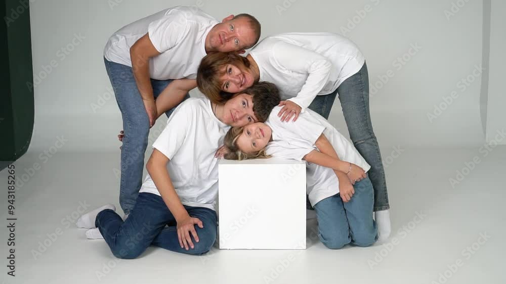 portrait of family, parents and teenage boy and girl. Pyramid photos of ...