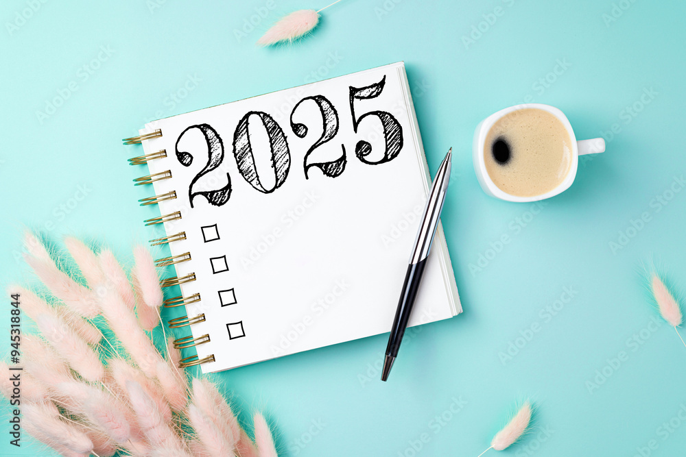 New year resolutions 2025 on desk. 2025 resolutions list with notebook ...