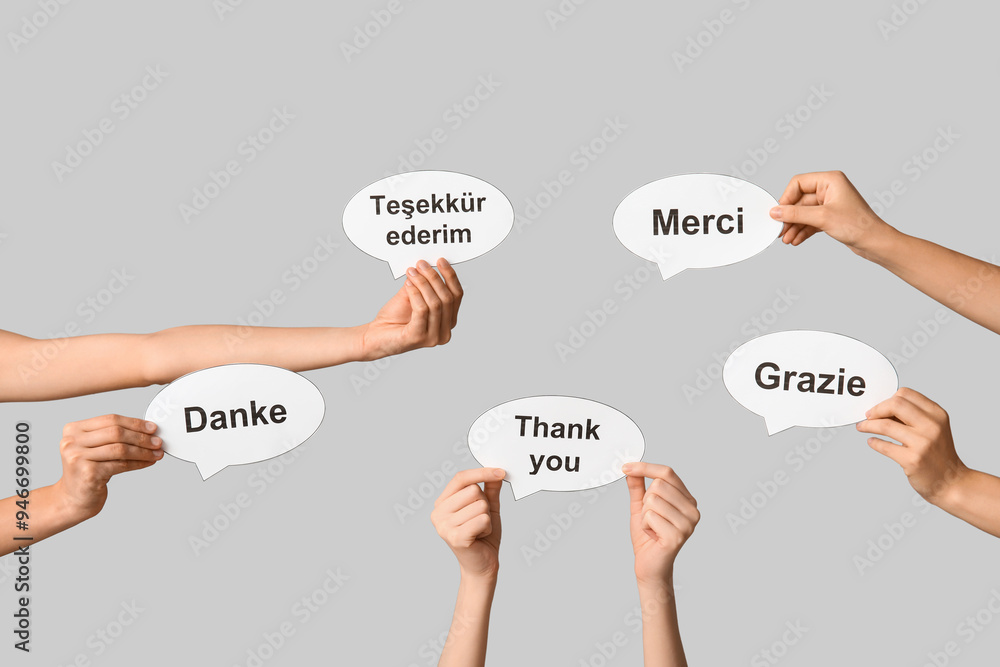 Female hands holding speech bubbles with text THANK YOU in different ...