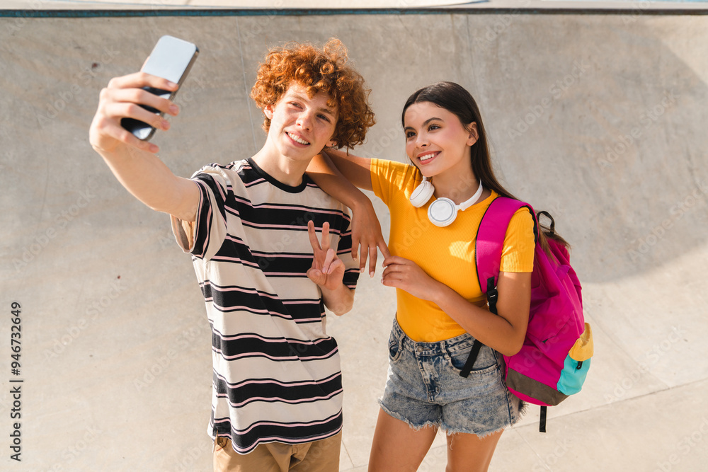 Couple of teenagers classmates students high school pupils friends boy ...