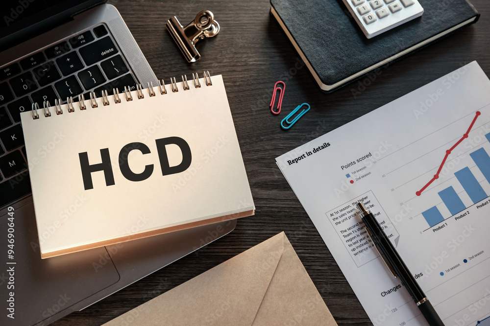 There is notebook with the word HCD. It is an abbreviation for Human ...