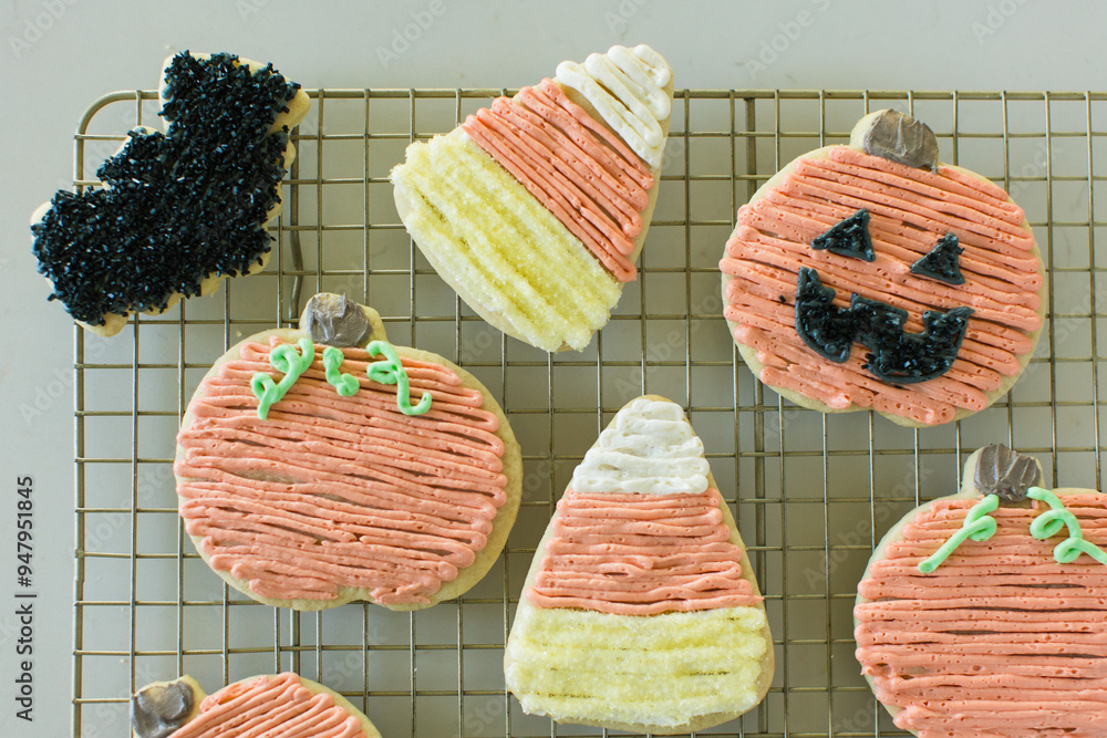 Cooling rack full of frosted Halloween sugar cookies Stock Photo ...