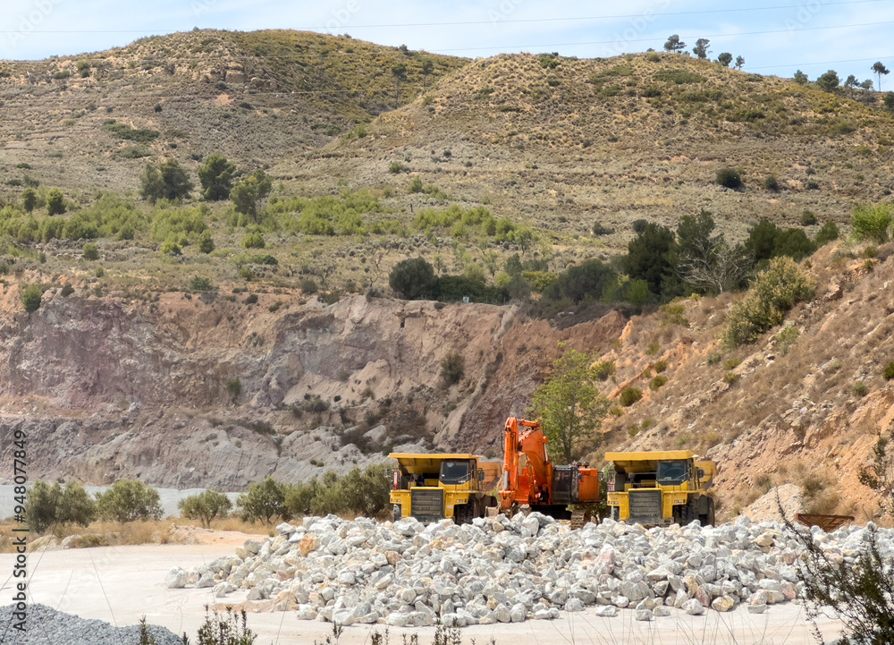 Mining truck in open-pit mining. Excavator and Haul truck on lithium ...