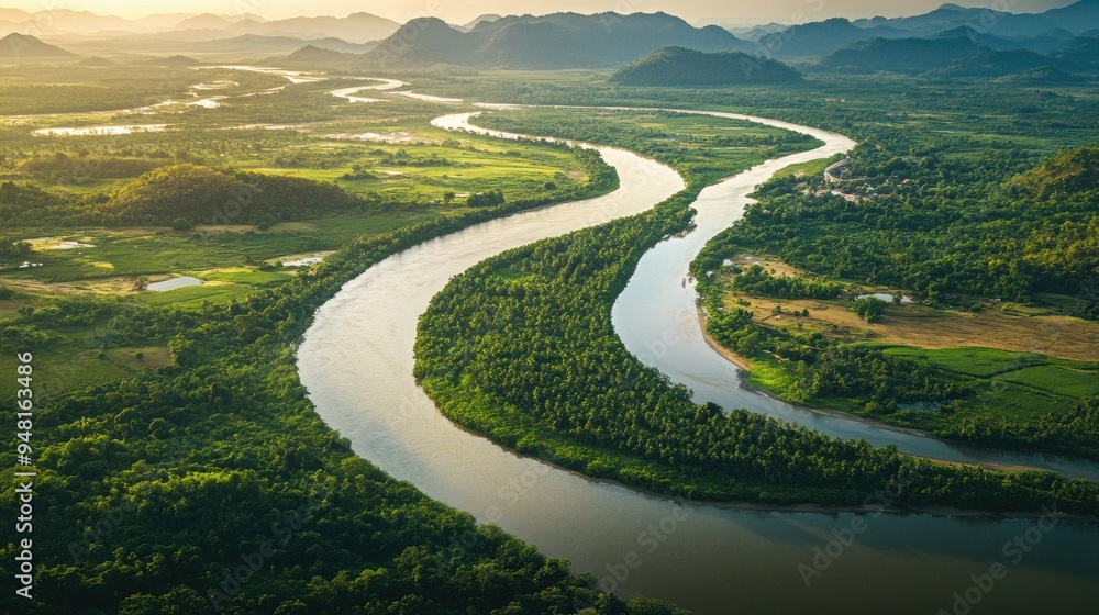 Aerial view of the Mekong River winding through lush landscapes in ...