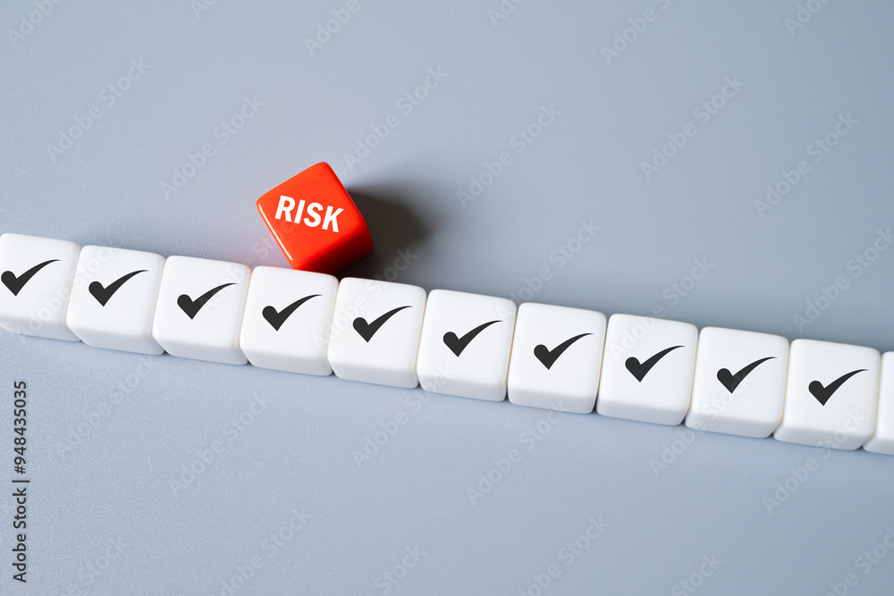 close up at the red cube to identify red danger risk cube among other ...