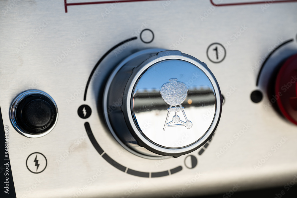 Regulator knob of a gas barbecue. Stock Photo | Adobe Stock