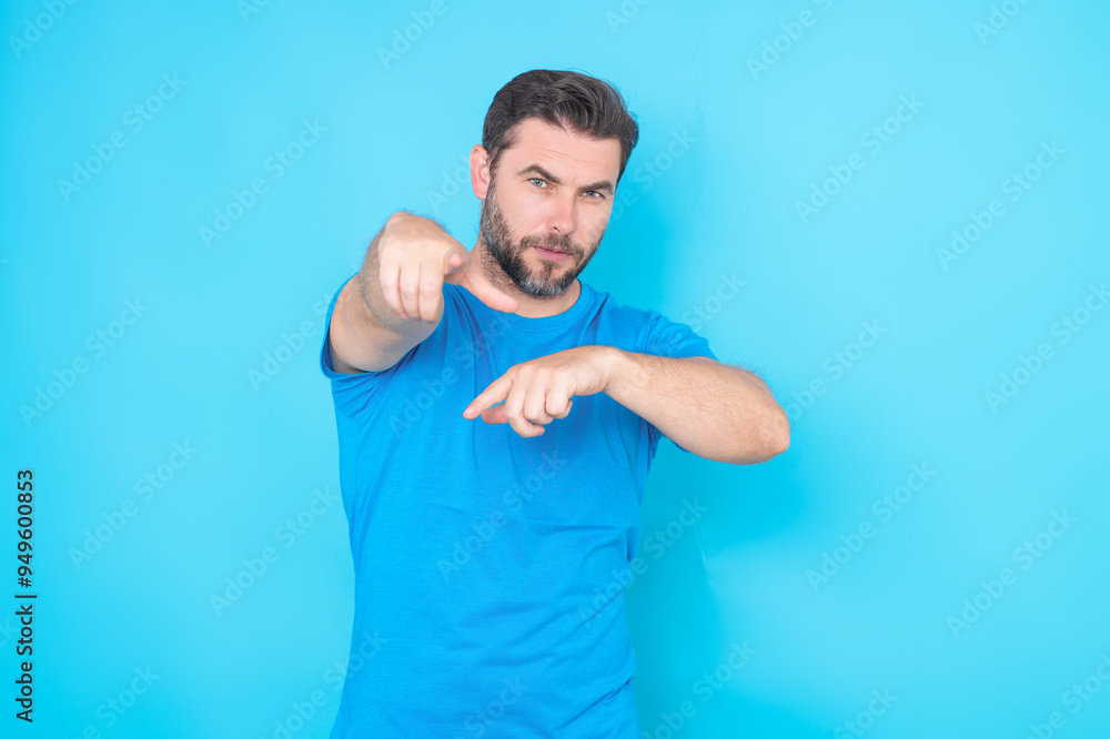 Gesture pointing finger at you. The point you. Happy handsome man ...