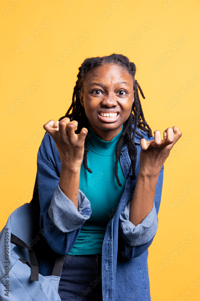Portrait of african american woman feeling frustration, clawing hands ...