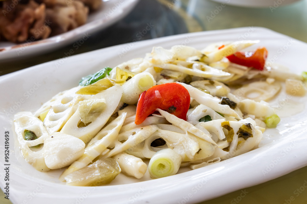 Serving of simple and authentic Sichuan cuisine of stir fried bamboo ...