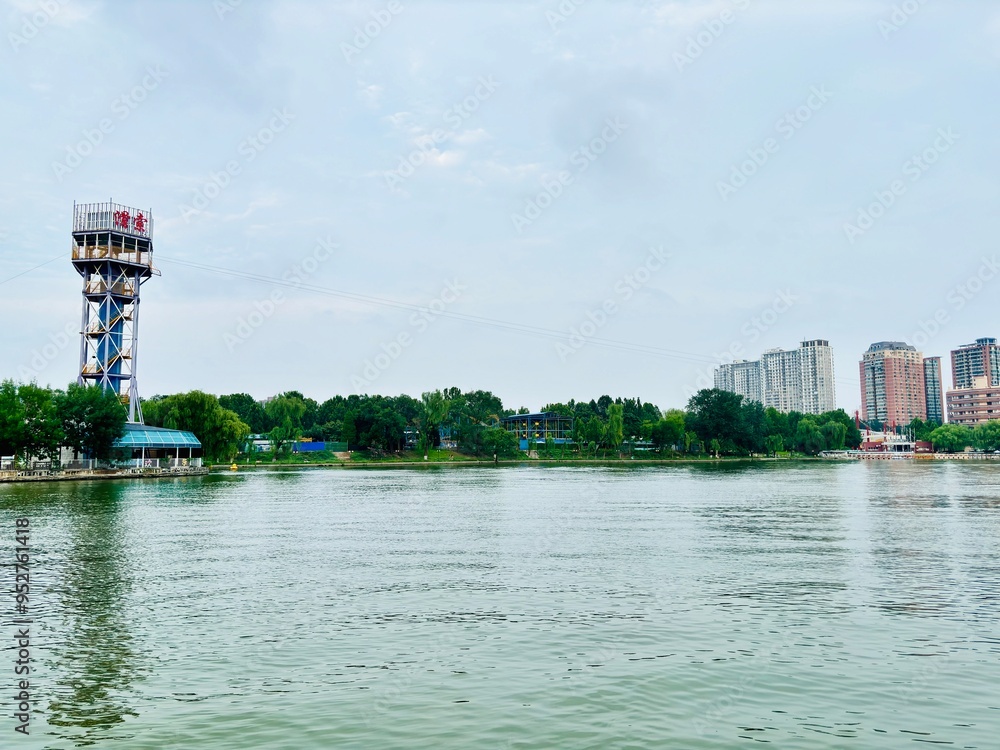 Tower View blue sky and water in Chaoyang Lake Park, Beijing, China ...
