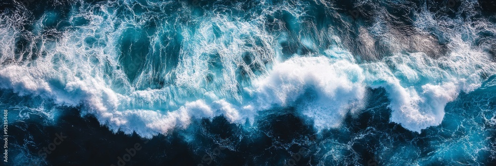 This aerial perspective captures the powerful movement of whitecapped ...