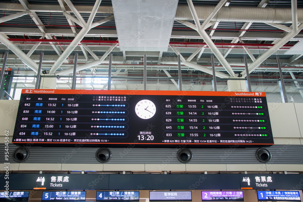 Train arrival and departure information board at HSR counter in Chiayi ...