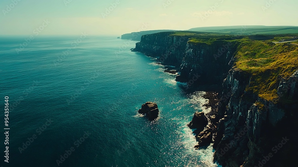 Rugged Cliffs Meet the Vast Atlantic Ocean in Ireland Stock Photo ...