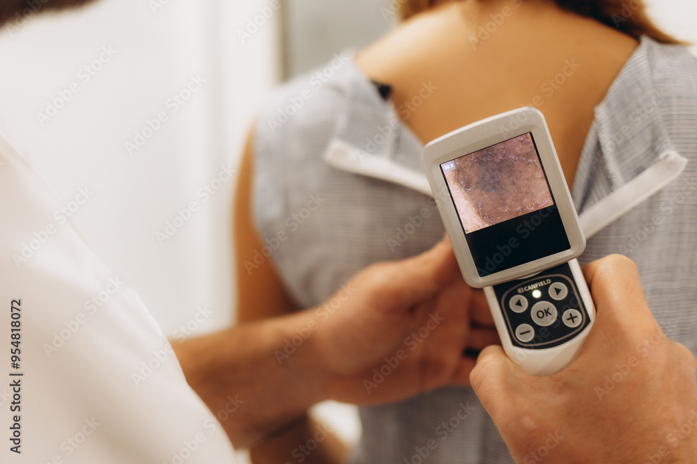 Doctor and female client in dermatology clinic. Macro photo of ...