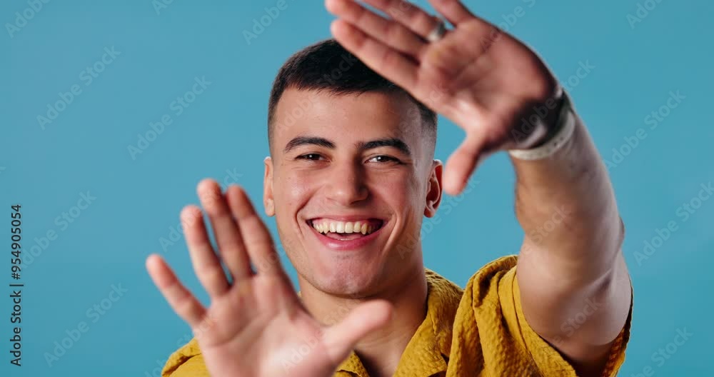Happy man, finger frame and face for photography in studio, live ...